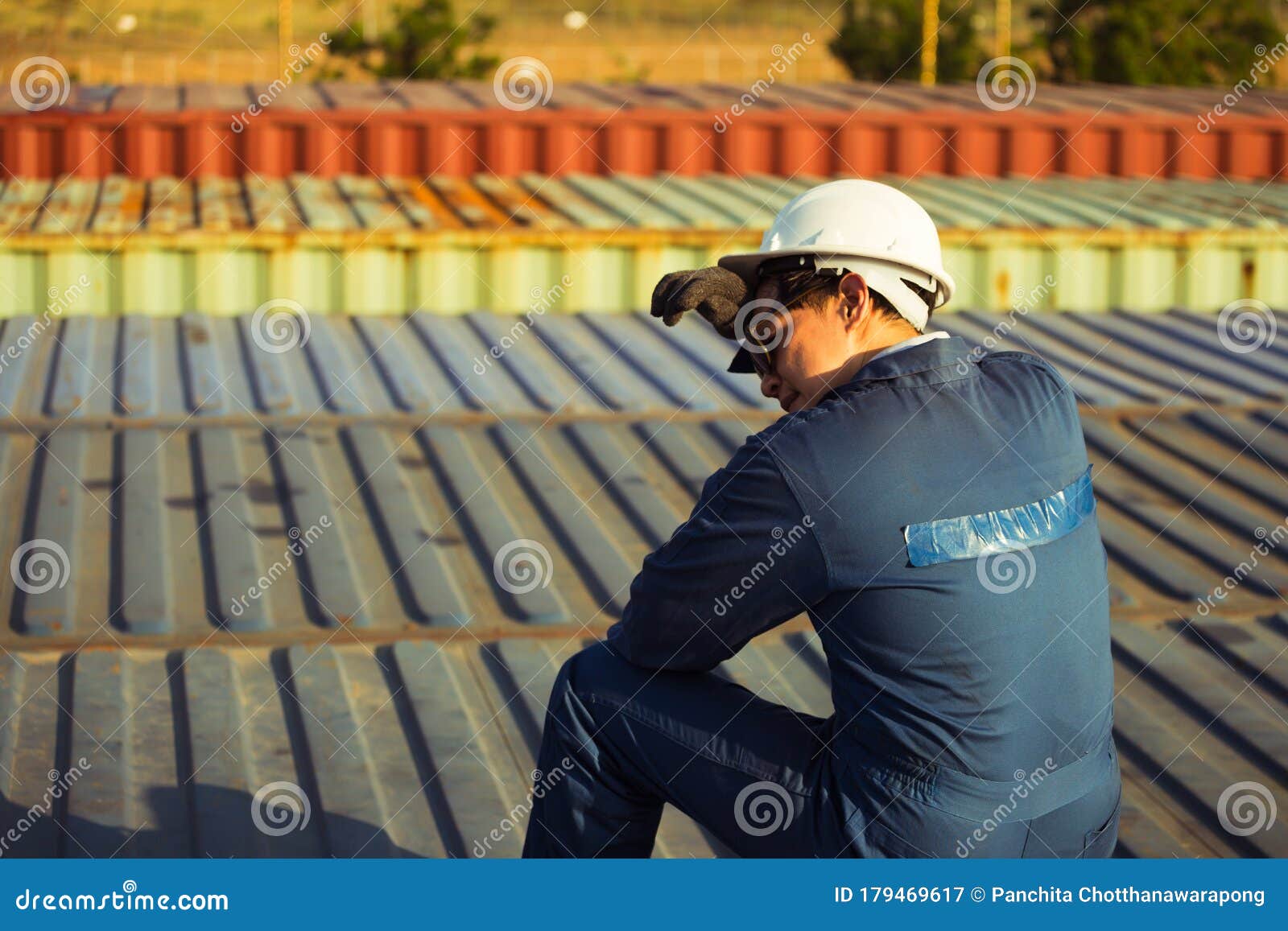 Lonely Foreman Worker Lost in Depression on the Containers Box in the ...