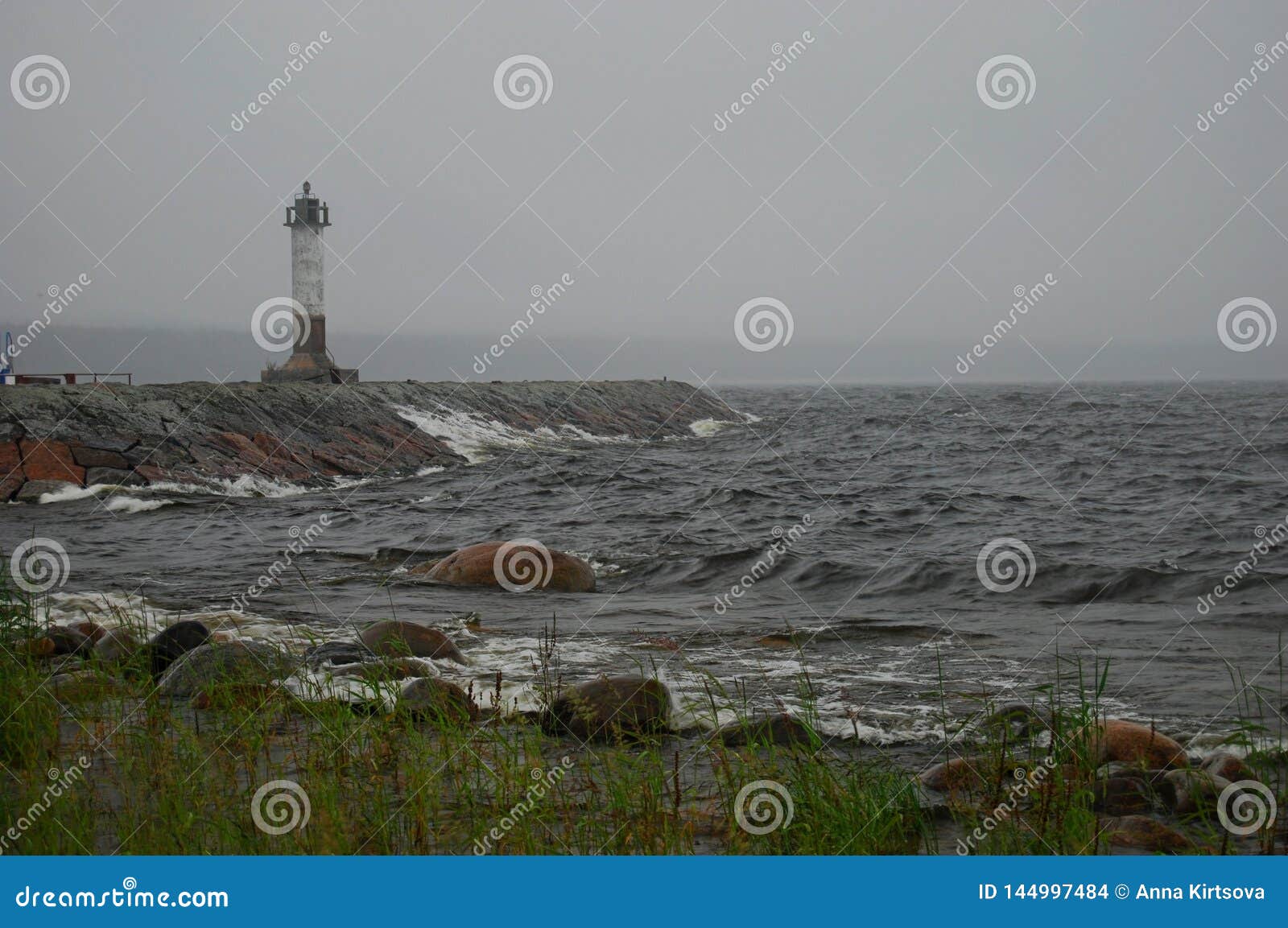 Lonely Lighthouse in the Sea Stock Photo - Image of ocean, shore: 144997484