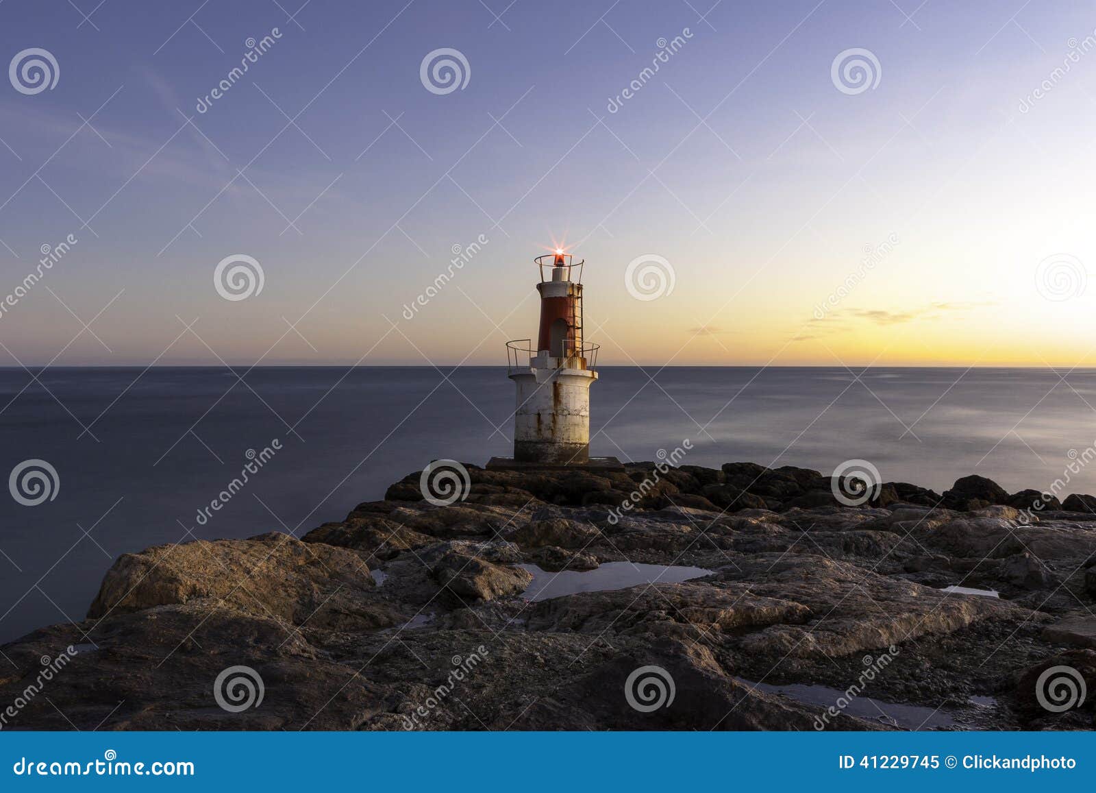 Lonely Lighthouse at Sunrise Stock Image - Image of dramatic ...