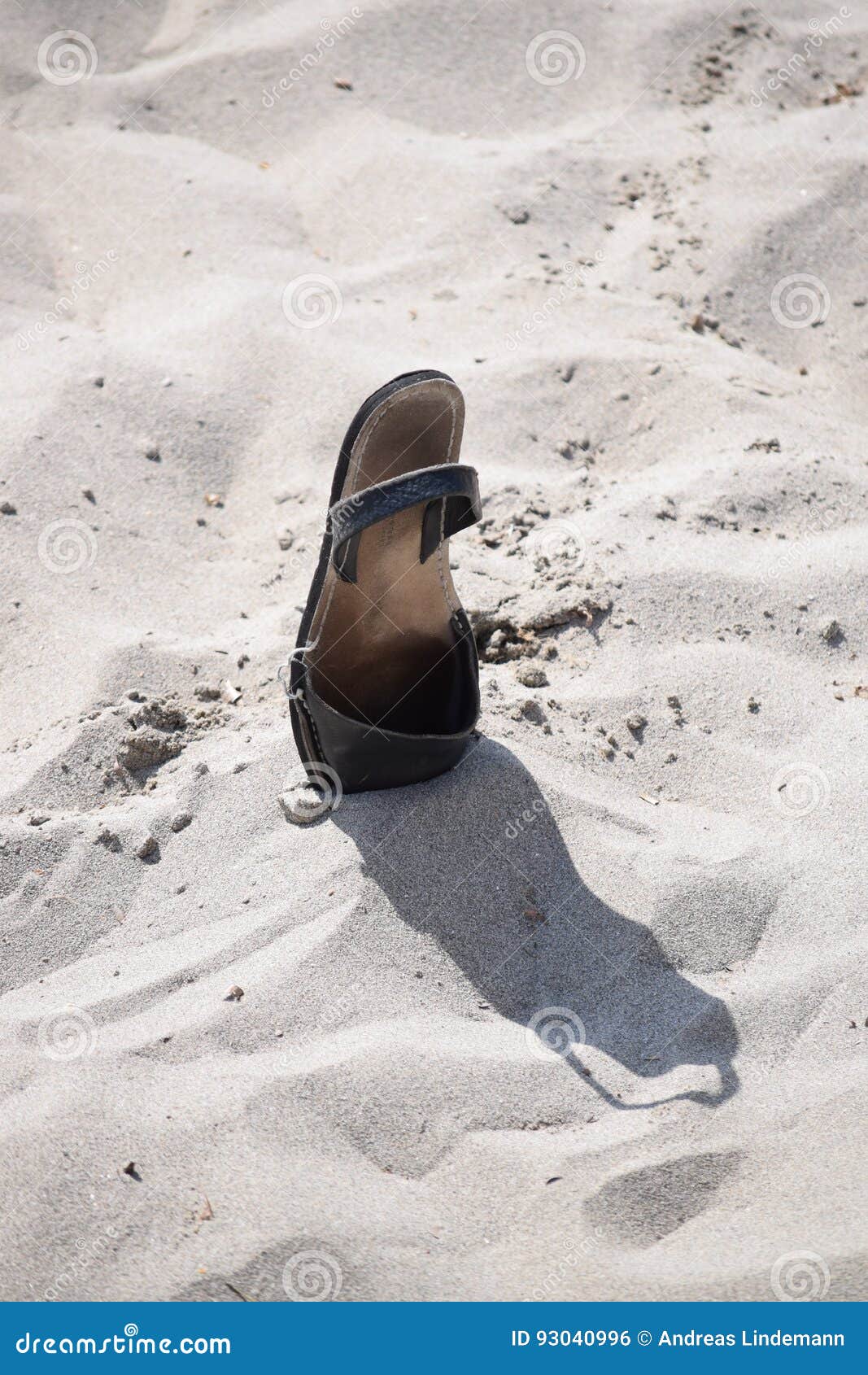 Lonely Lost Right Sandal Sticking Head First in the Sand Stock Photo ...