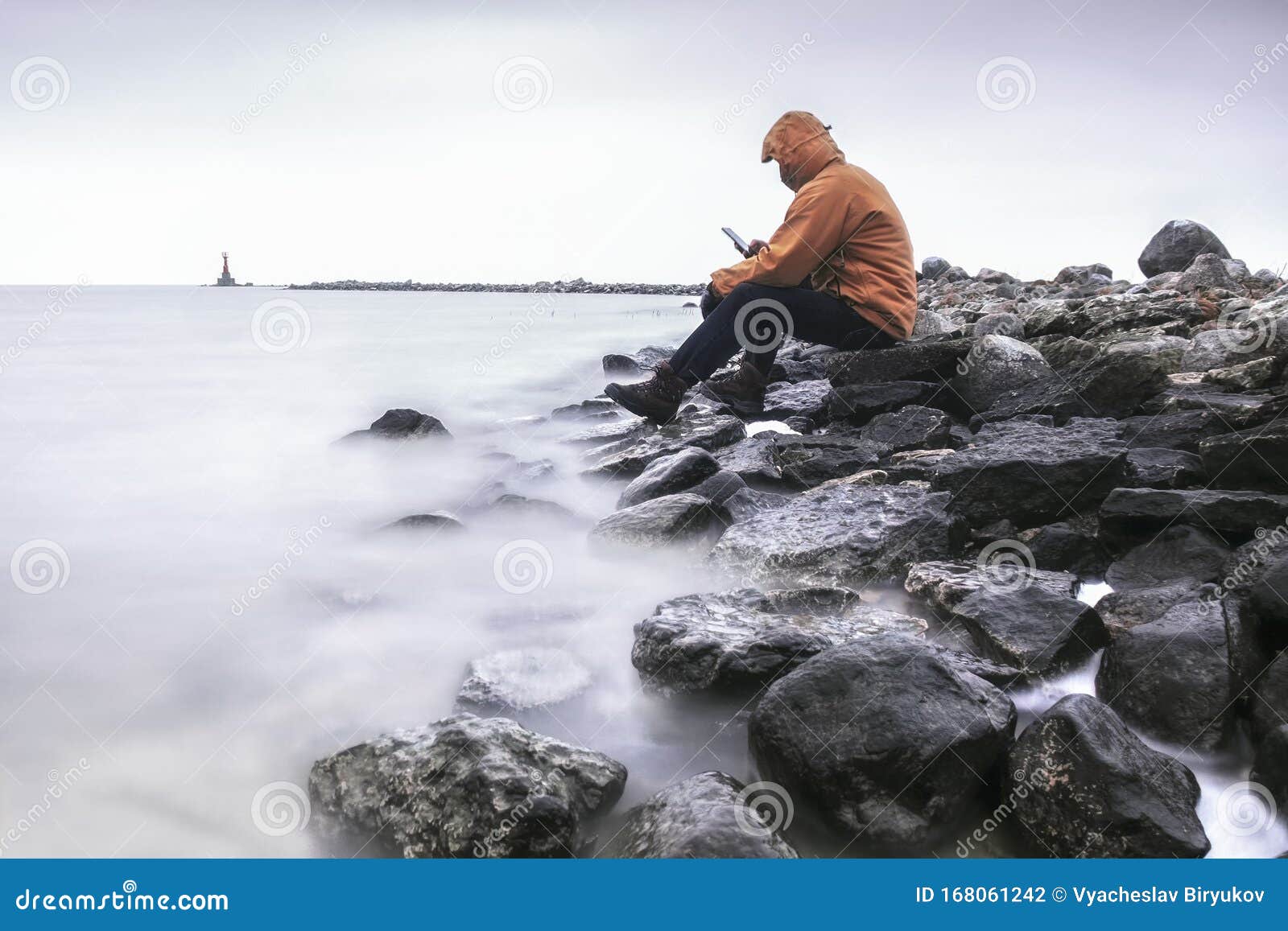 A Lonely Man on the Seashore Stock Photo - Image of desolation, despair ...