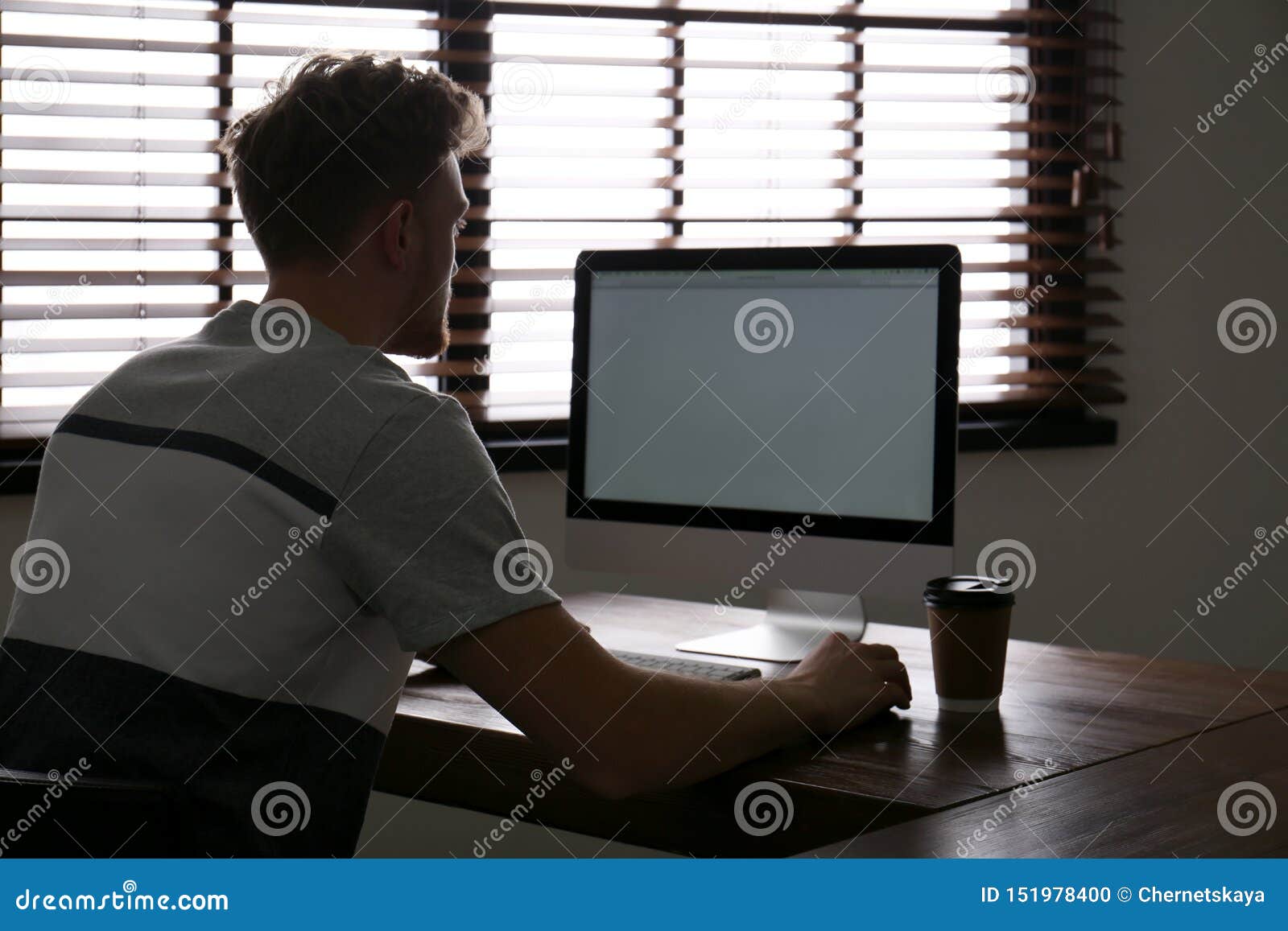 Lonely Man Sitting at Computer with Empty Screen Stock Photo - Image of ...
