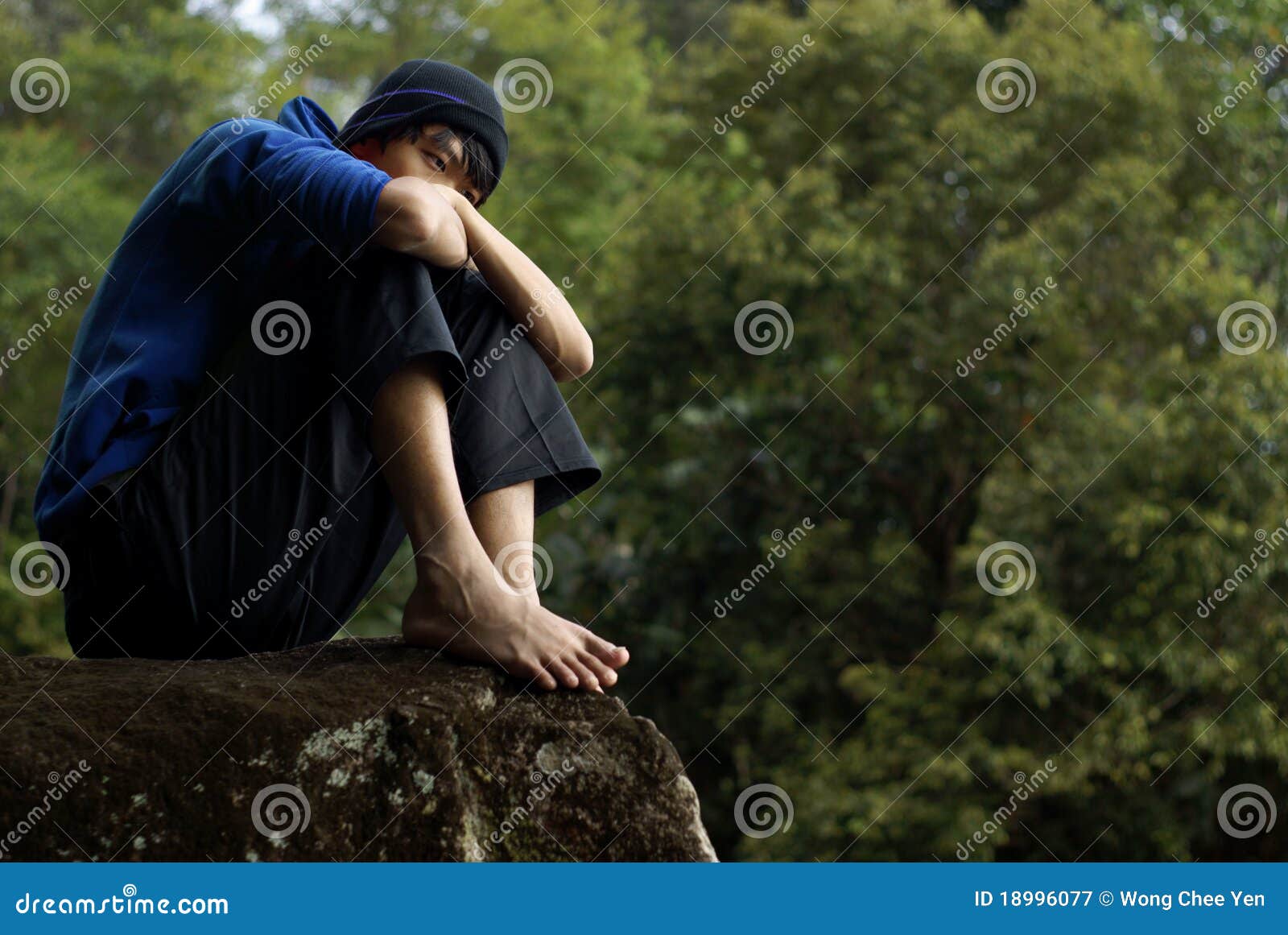 Lonely Man Sitting Outdoors Stock Image - Image of blue, loneliness ...