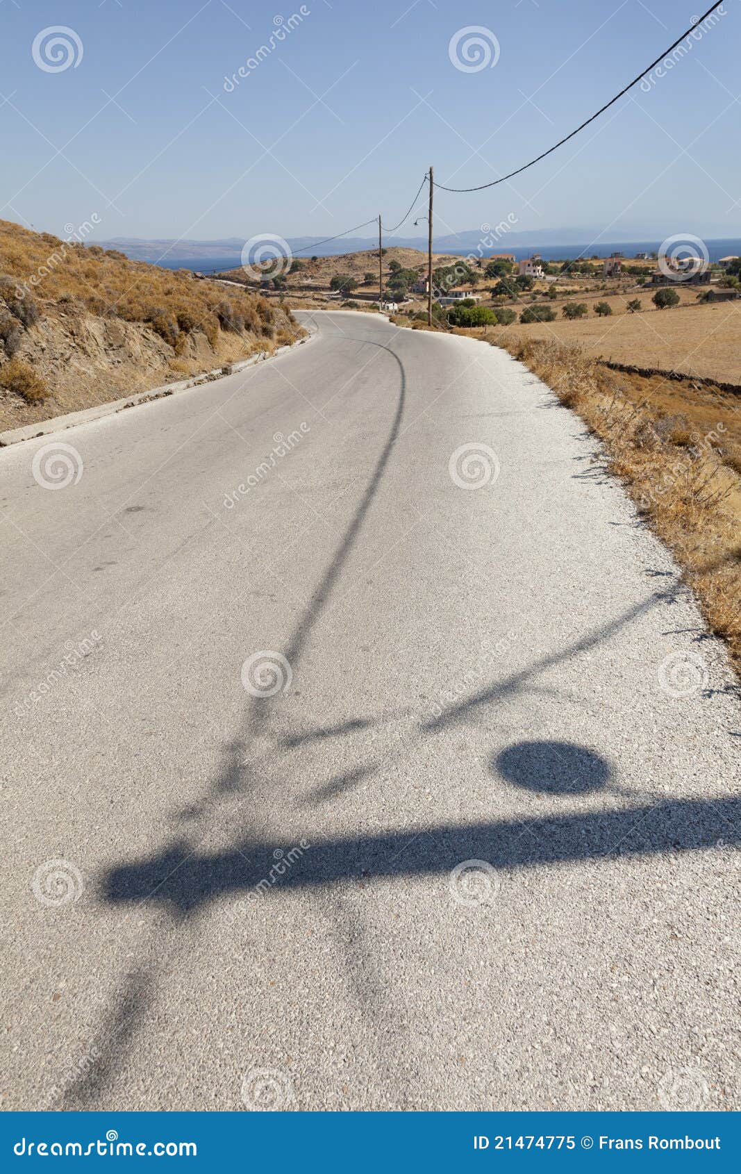 Lonely road with shadows stock image. Image of abandoned - 21474775