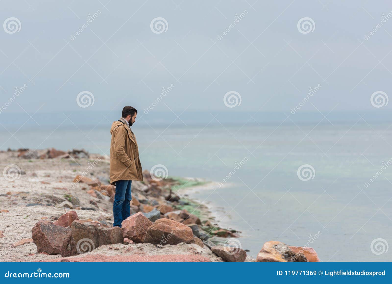 Lonely sad man standing stock image. Image of standing - 119771369