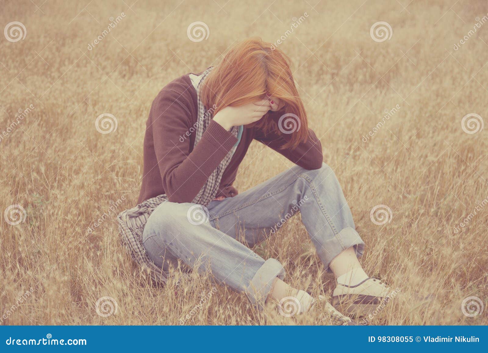 Lonely sad red-haired girl stock image. Image of outside - 98308055
