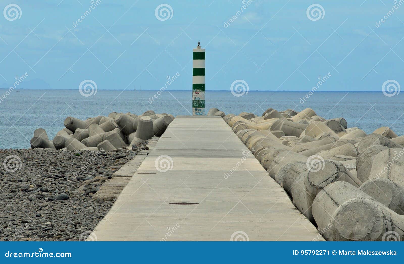 A lonely shore beacon stock image. Image of pavement - 95792271