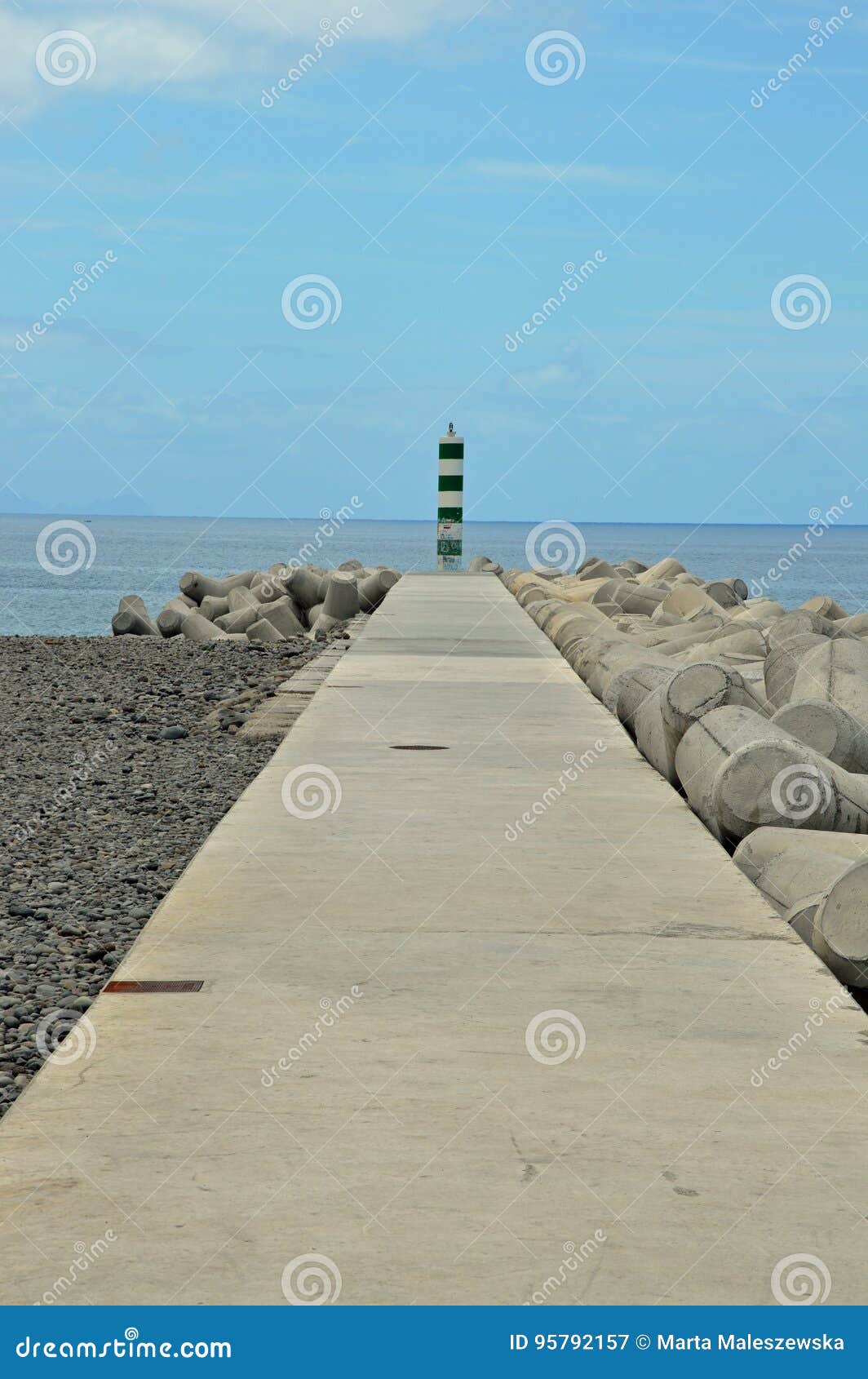 A lonely shore beacon stock image. Image of ocean, beach - 95792157