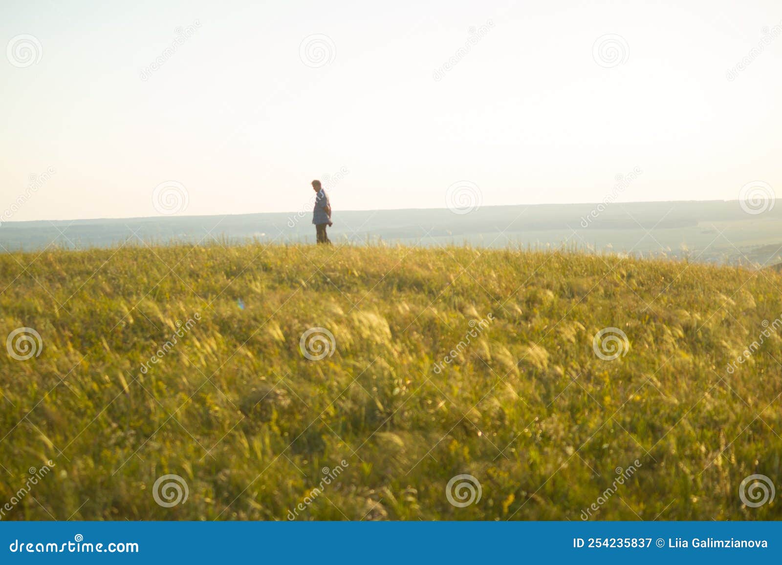Lonely silhouette of a man stock image. Image of person - 254235837
