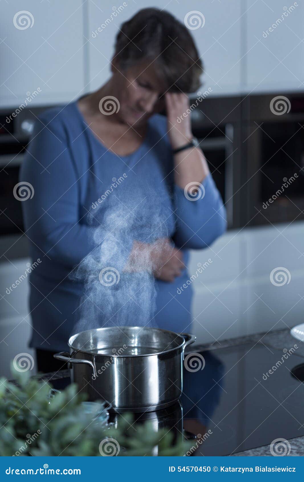 Lonely widow cooking stock photo. Image of depressed - 54570450