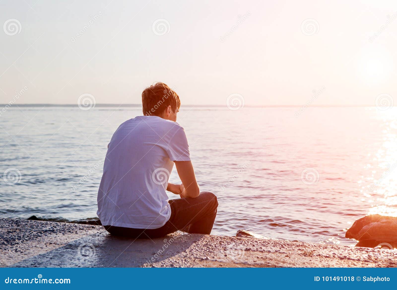 Young Man at Seaside stock photo. Image of calm, ocean - 101491018