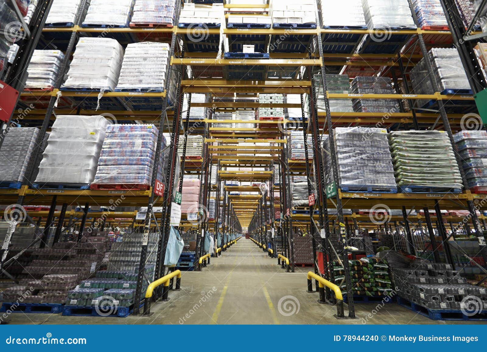 Long Aisle between Storage Racks in a Distribution Warehouse Stock ...