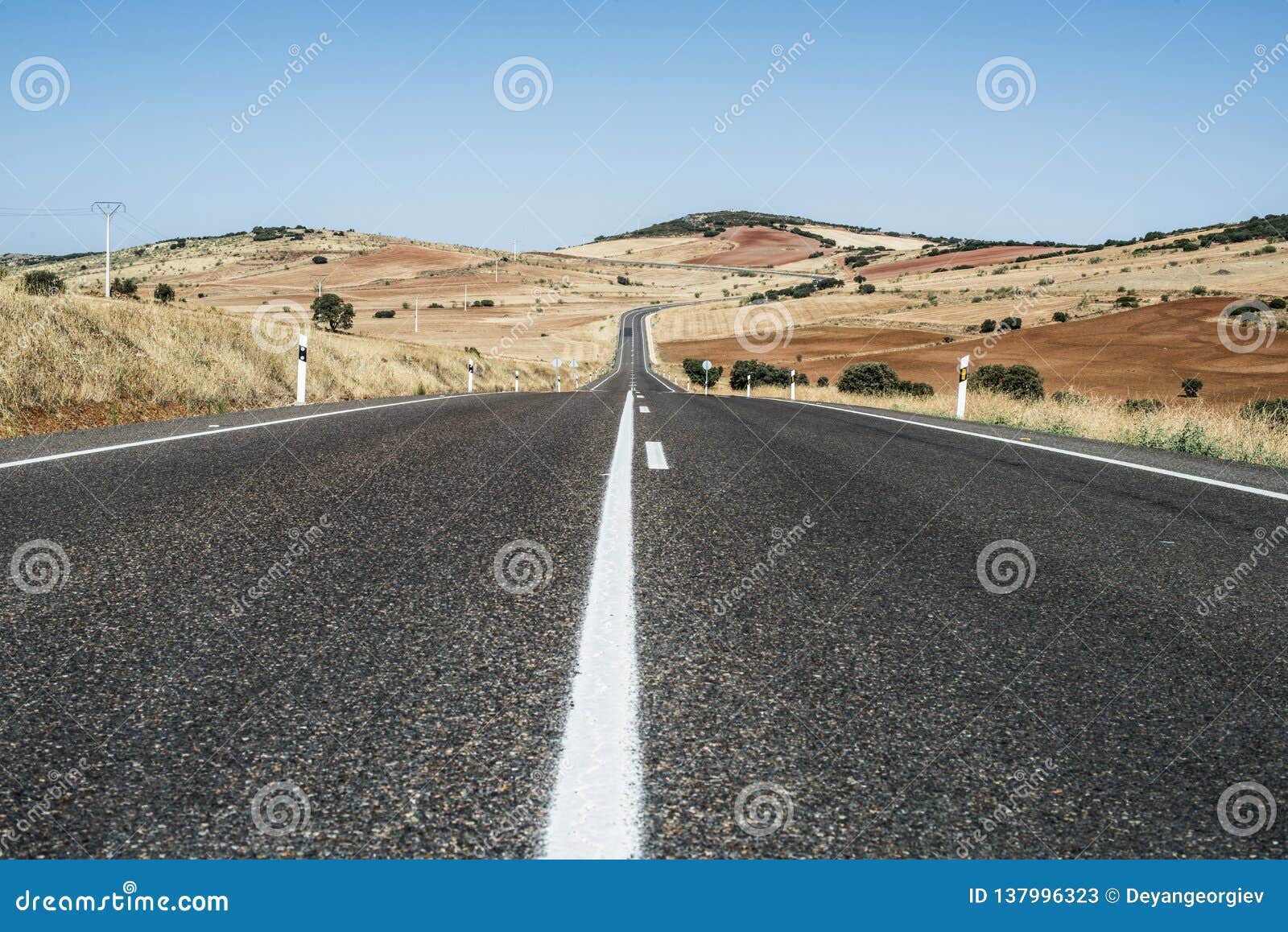 Long asphalt road stock image. Image of rural, blue - 137996323