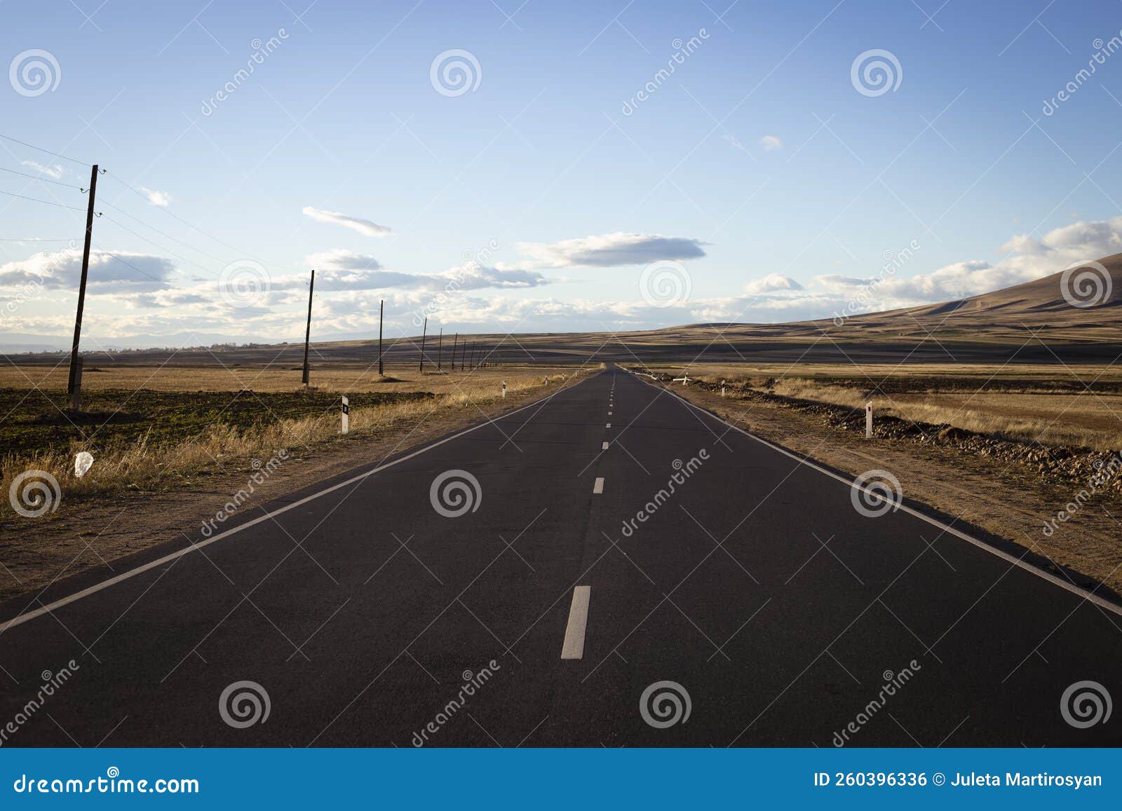 Long Asphalt Road and Fields Stock Photo - Image of dawn, traffic ...