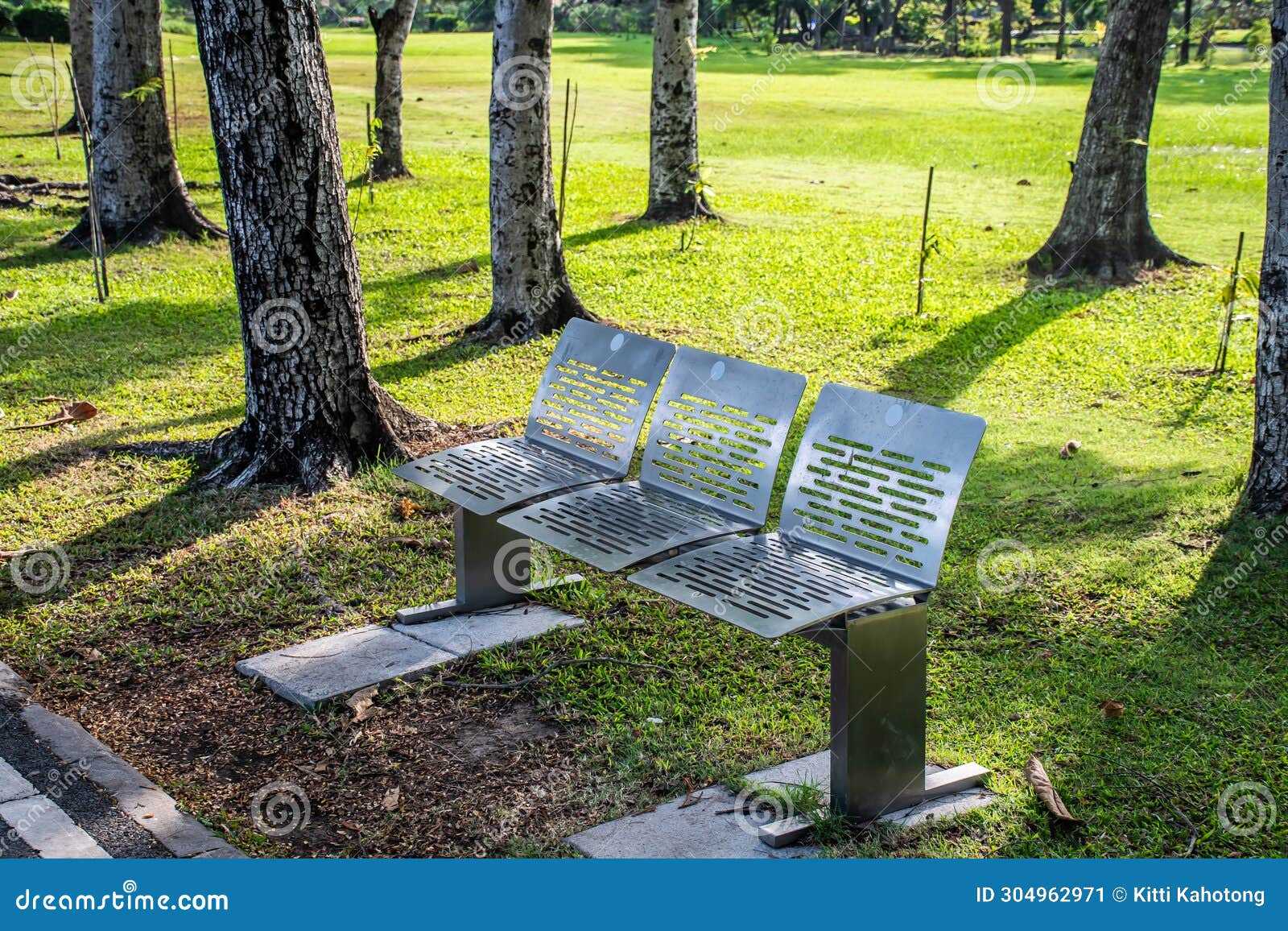 Long bench in the park stock image. Image of long, green - 304962971