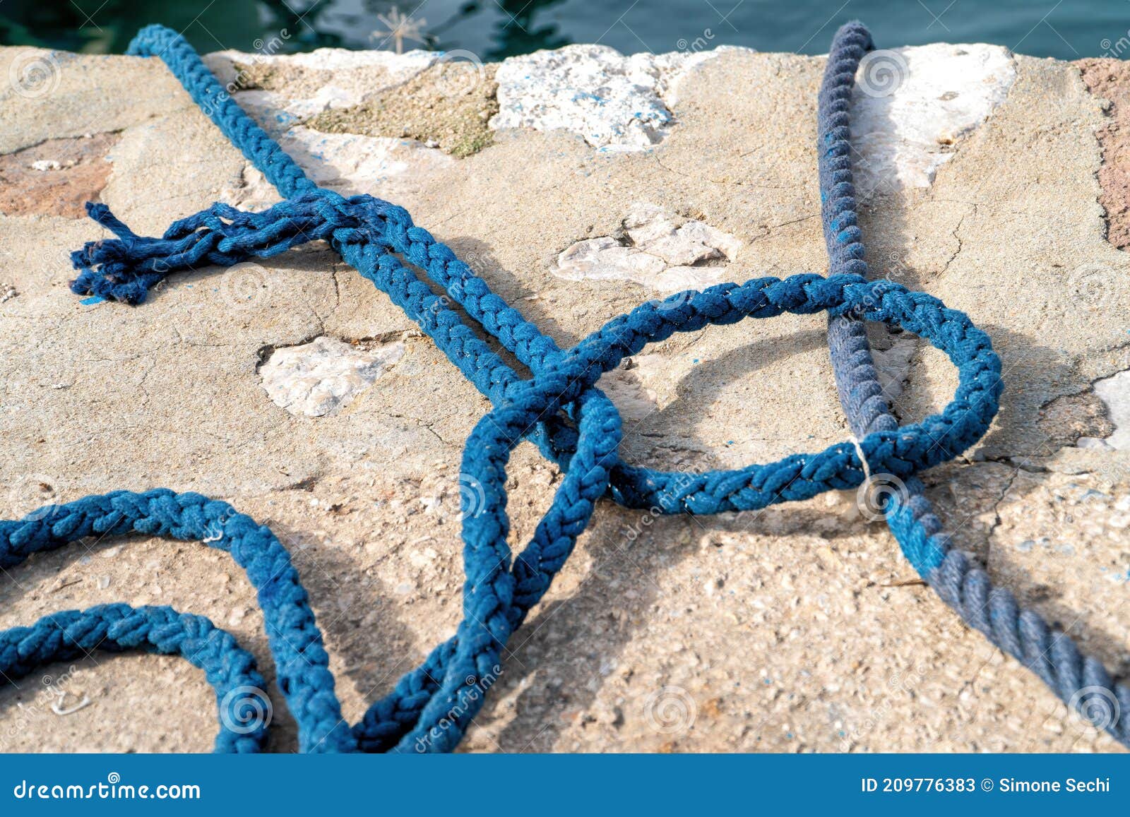 A Long Blue Nautical Rope Along the Quayside Stock Image - Image of ...