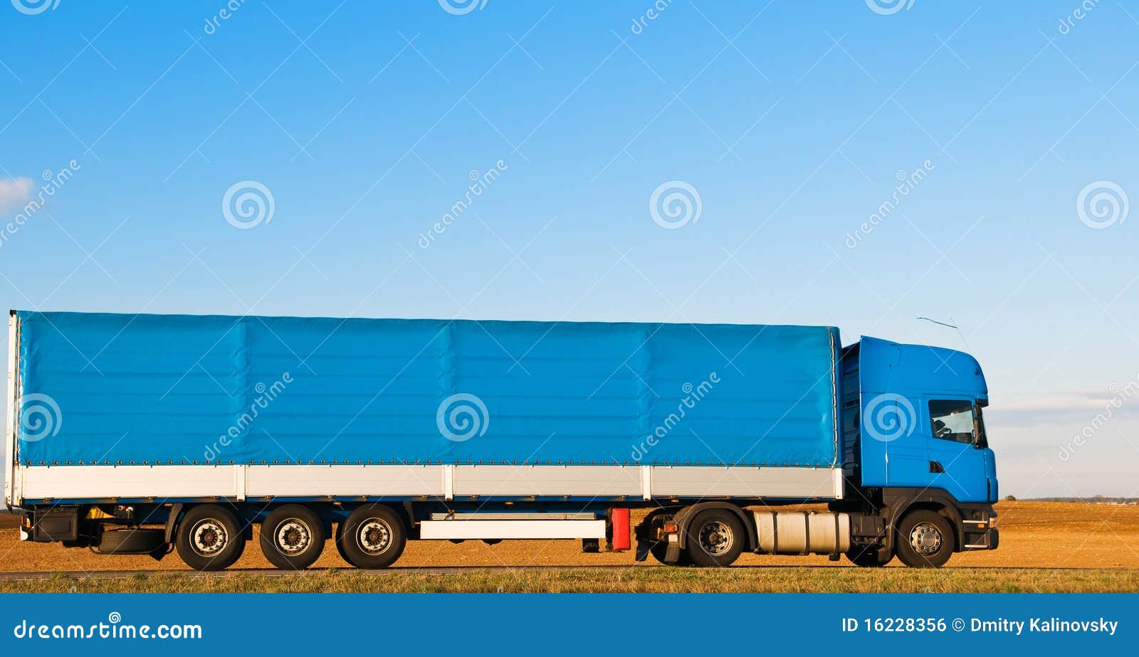 Long blue truck on highway stock photo. Image of transport - 16228356