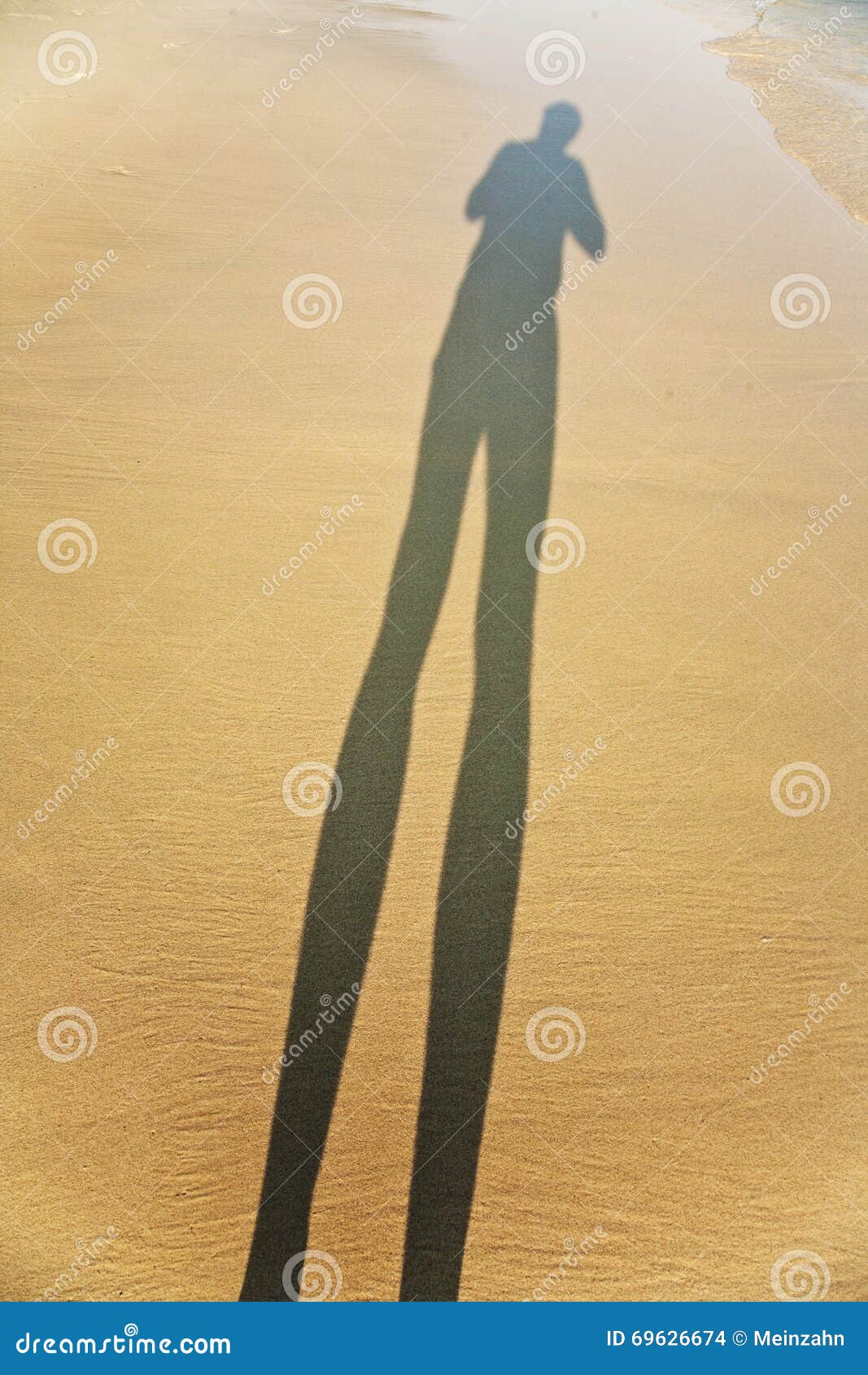 Long Body Shadow of a Man in the Fine Sand of the Beach, Feet is Stock ...