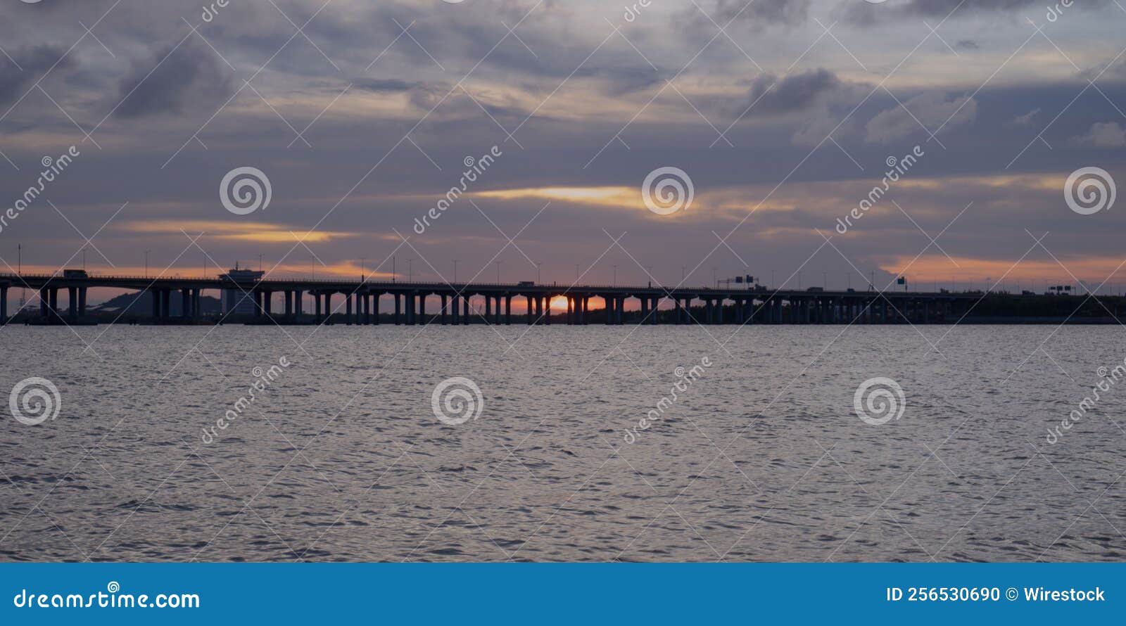 Long Bridge Over a Lake in the Sunset Stock Photo - Image of ...