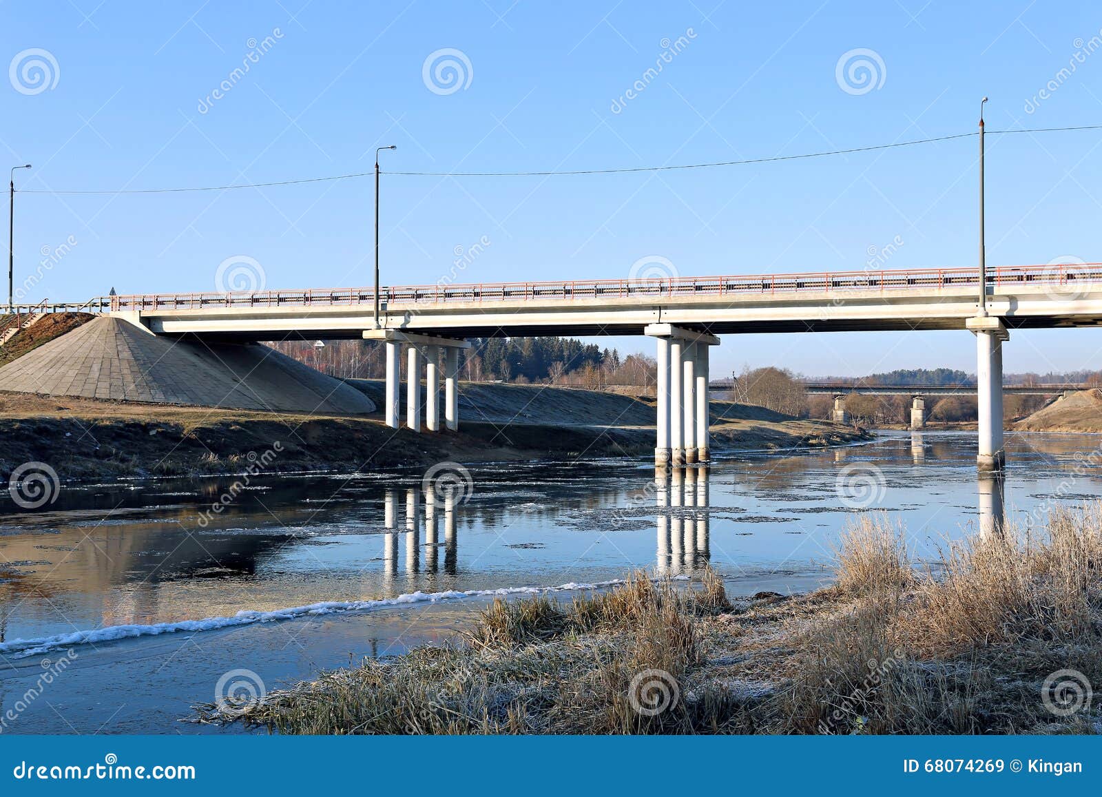 The Long Bridge on Piles Over the River and Floating of Ice Stock Image ...