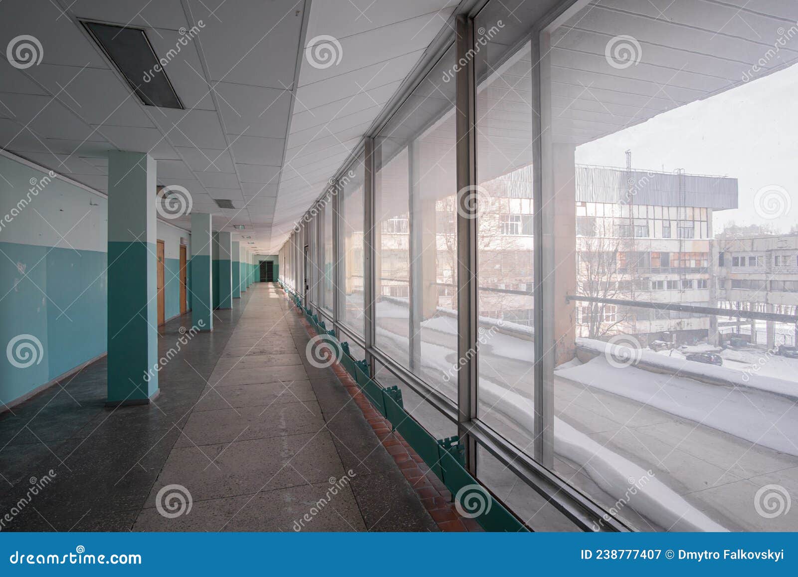 Long Bright Empty Corridor with Wide Windows of the Old Building in the ...