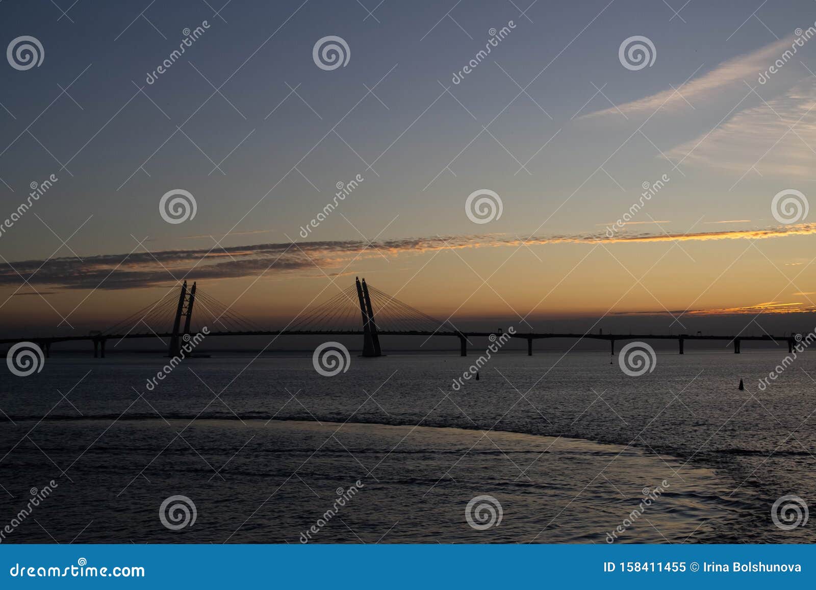 Long Cable-stayed Bridge on the Background of a Beautiful Sunset on the ...