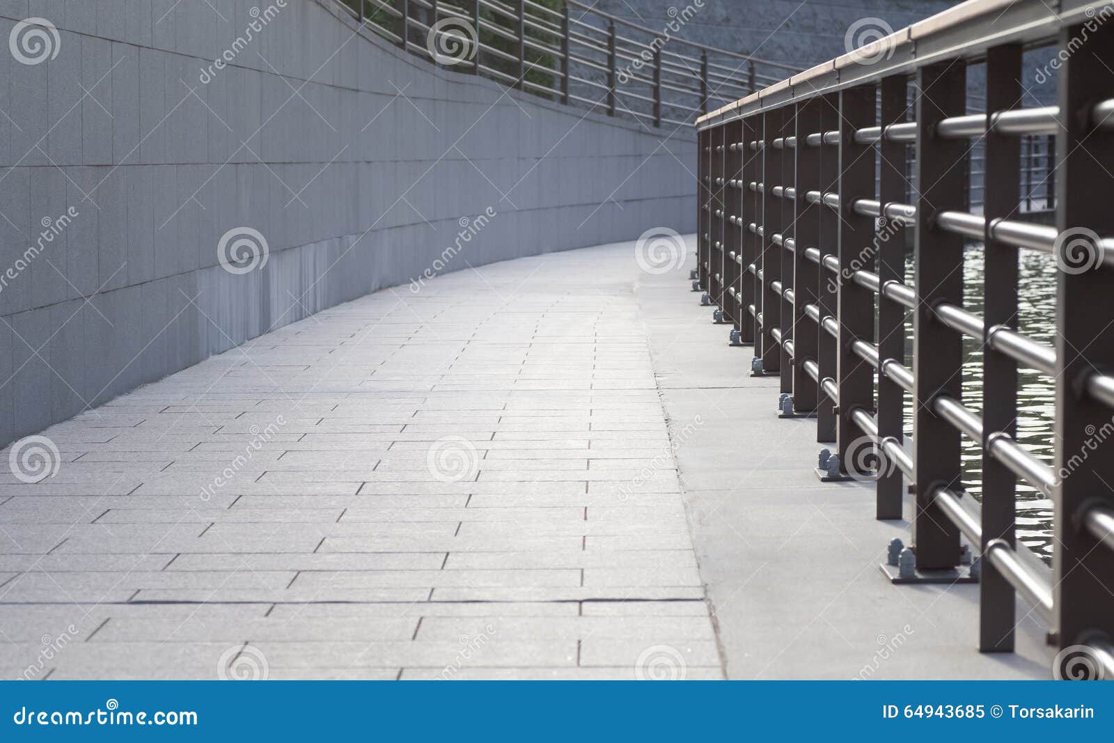 Long Concrete Pathway and Metal Fence Stock Image - Image of natural ...