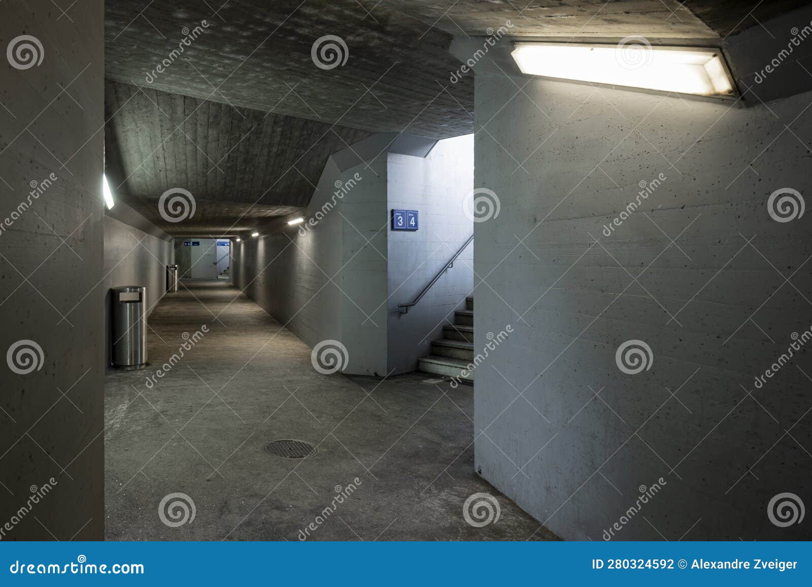 Long Concrete Pedestrian Corridor Under the Train Station with the ...