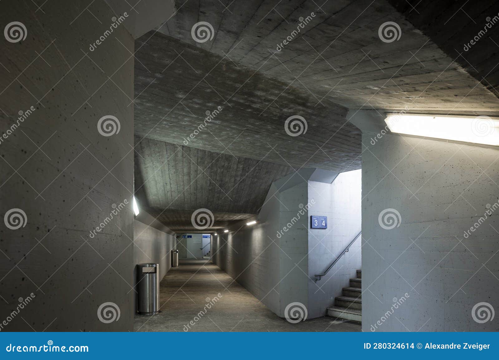 Long Concrete Pedestrian Corridor Under the Train Station with the ...