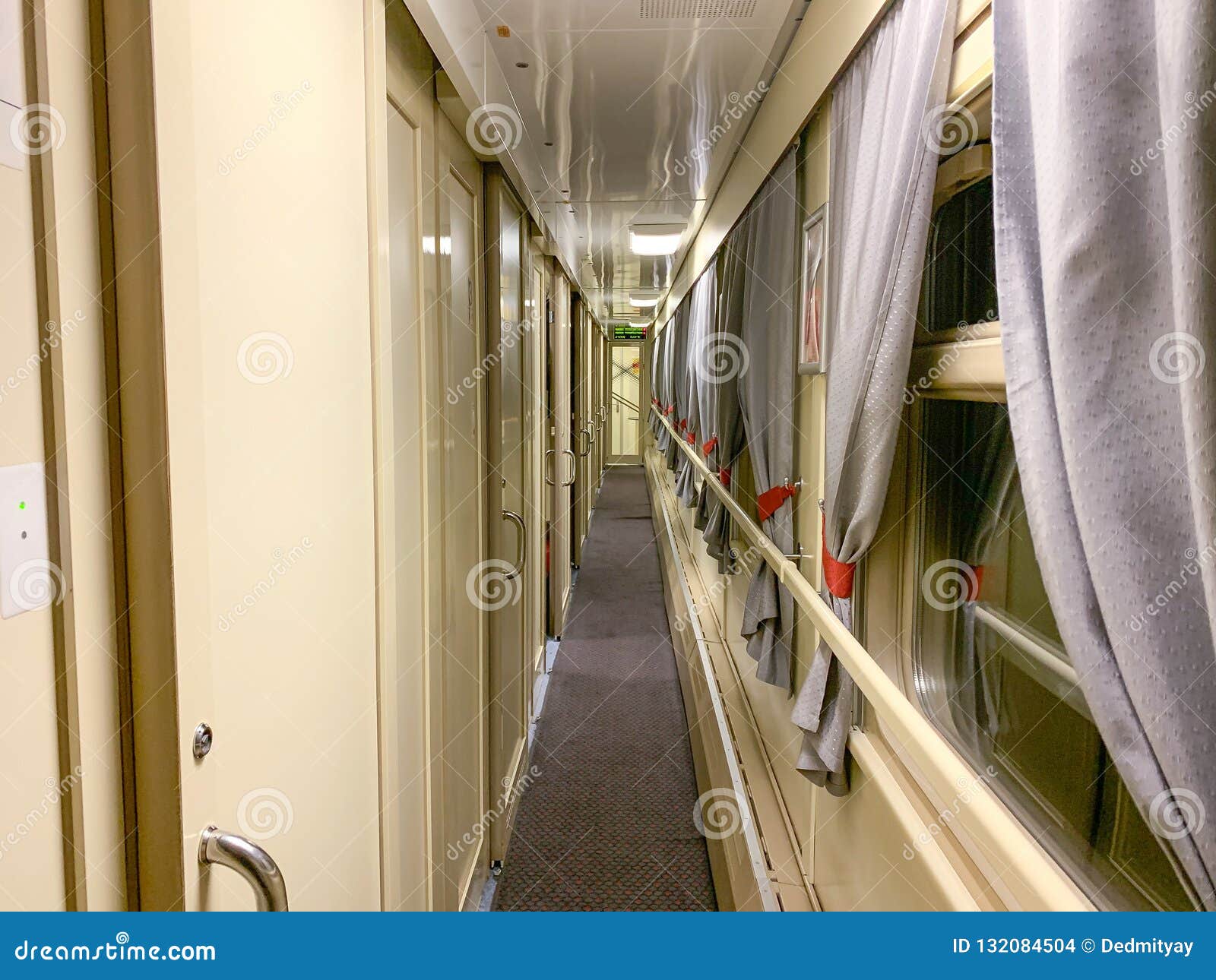 Long Corridor with Doors and Windows in Modern Railroad Train Inside ...