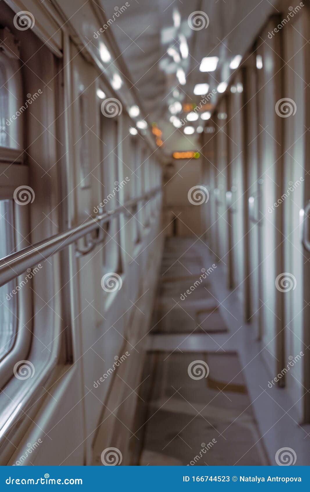 A Long Corridor Inside a Passenger Rail Car. Geometric Lines, Blurred ...