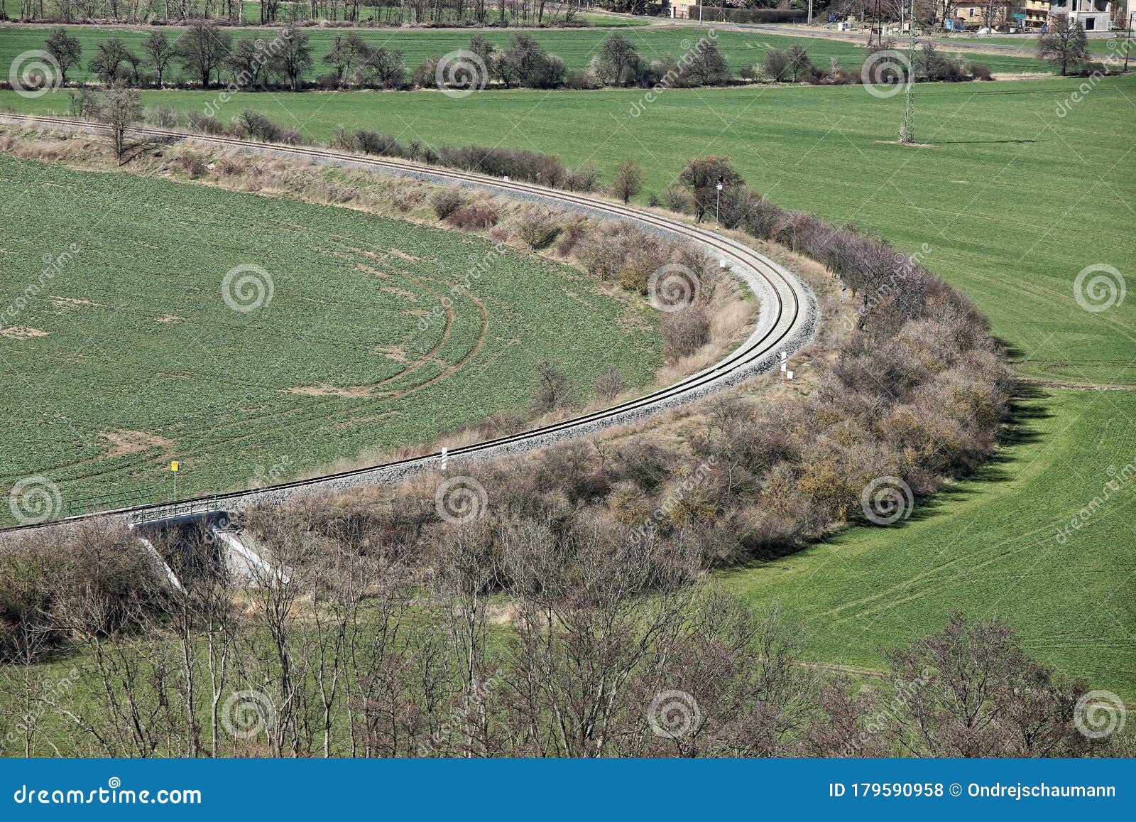 Long Curved Train Track between Fields on Spring Stock Photo - Image of ...