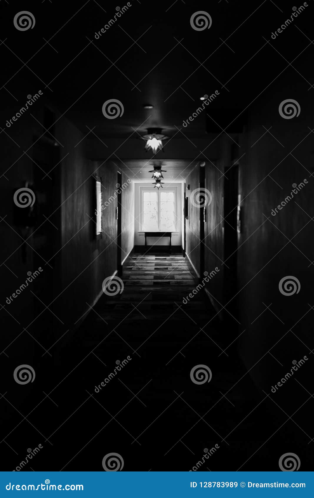 Long dark hallway to light stock image. Image of dark - 128783989