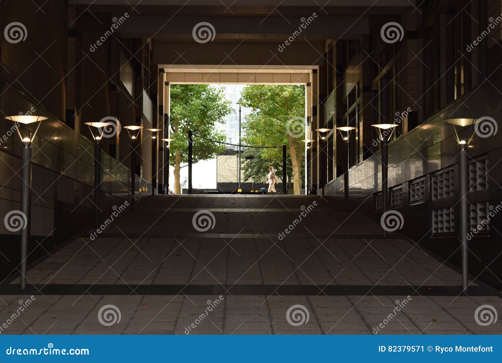 Long Dark Lit Pathway Leading Outside Editorial Photo - Image of ...