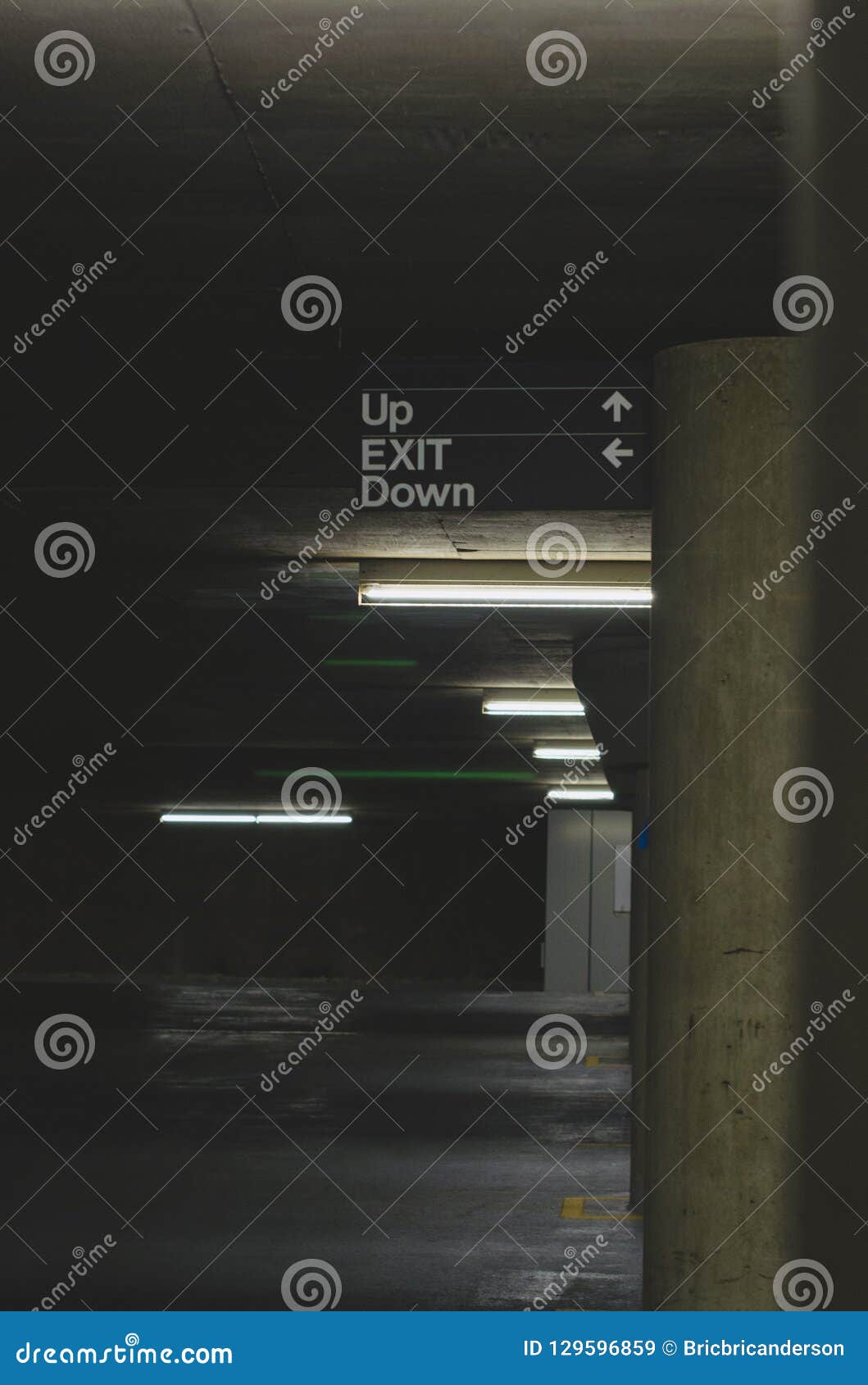 The Long Dark Parking Garage Exit Sign Arrows Royalty-Free Stock Photo ...