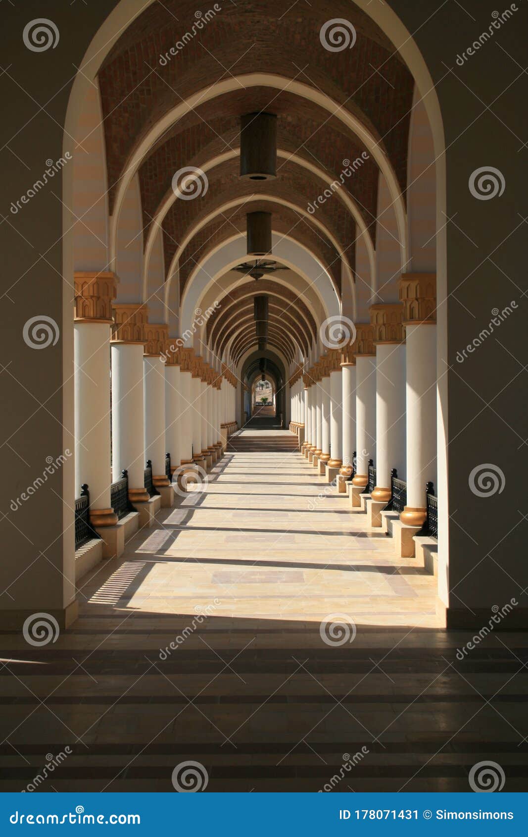Long Decorative Passageway Lined with Ornamental Pillars Stock Image ...