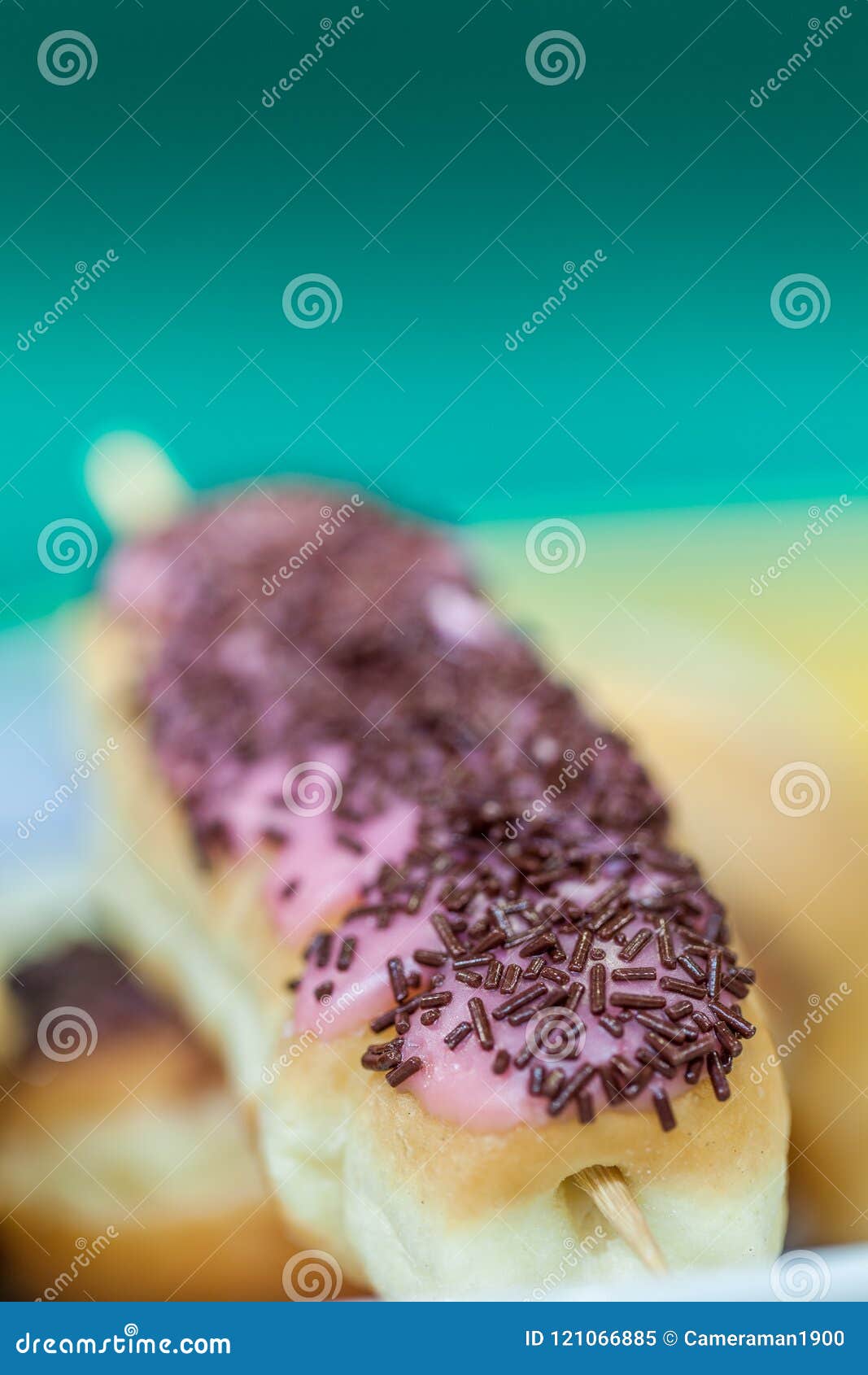CLOSEUP of LONG DONUTS with CHOCOLATE Stock Image - Image of sugar ...