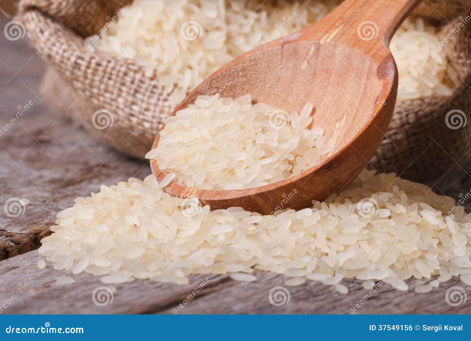 Long Dry Rice Macro Spill Out of the Bag on the Table Stock Photo ...