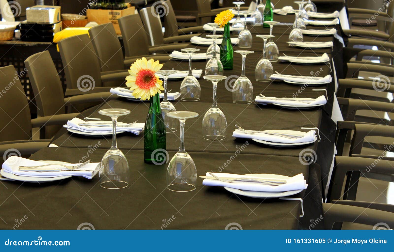 A Long and Elegant Decorated Table for Having Dinner with a Black ...