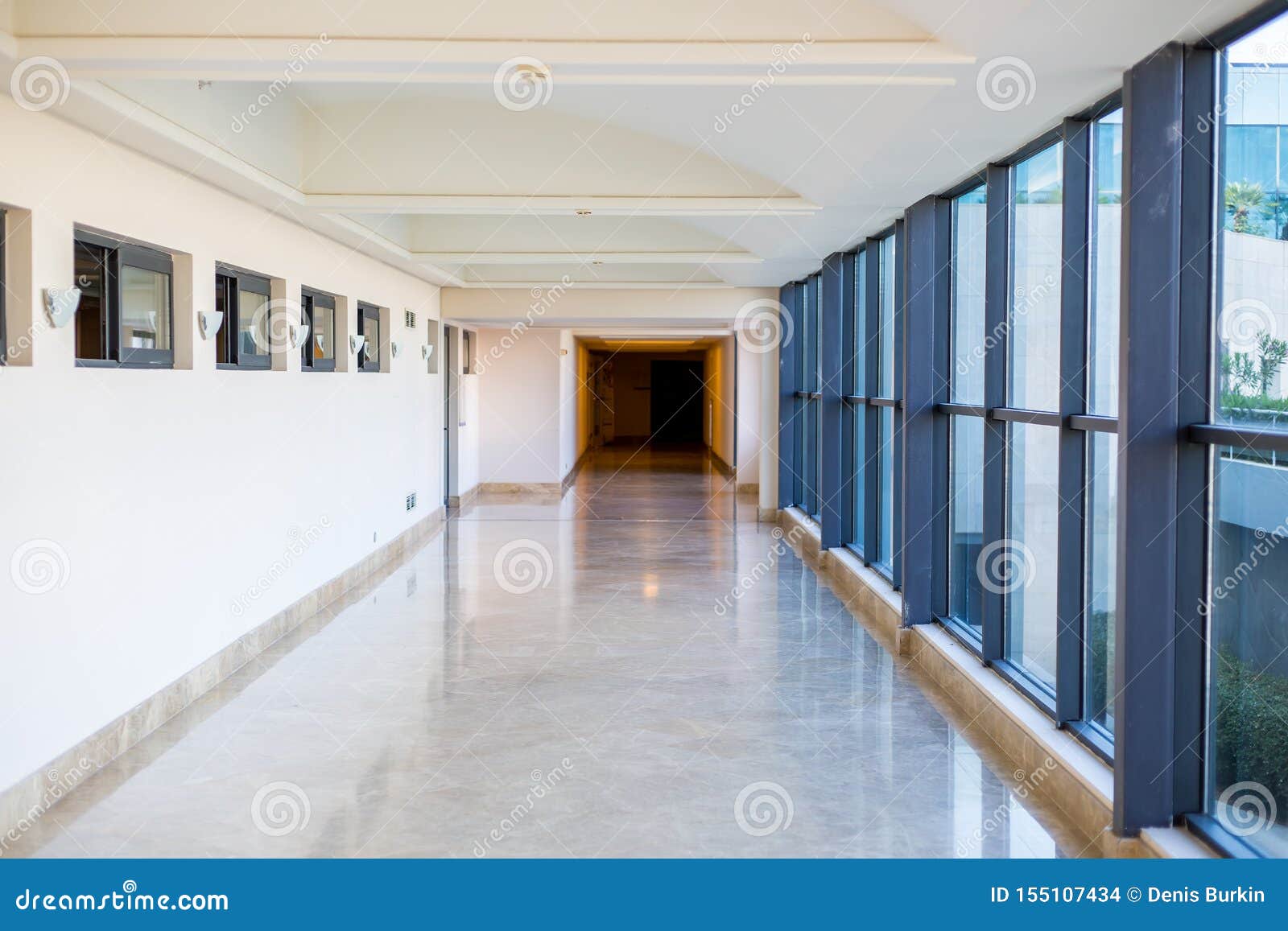 Long Empty Corridor with Large Glass Windows. Modern Corridor Stock ...