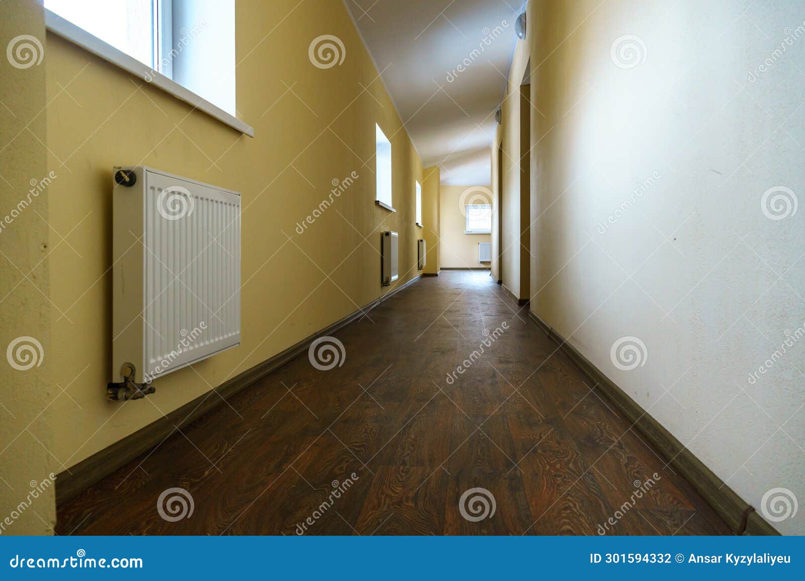 A Long Empty Corridor in an Office Building. a New Modern Heating ...