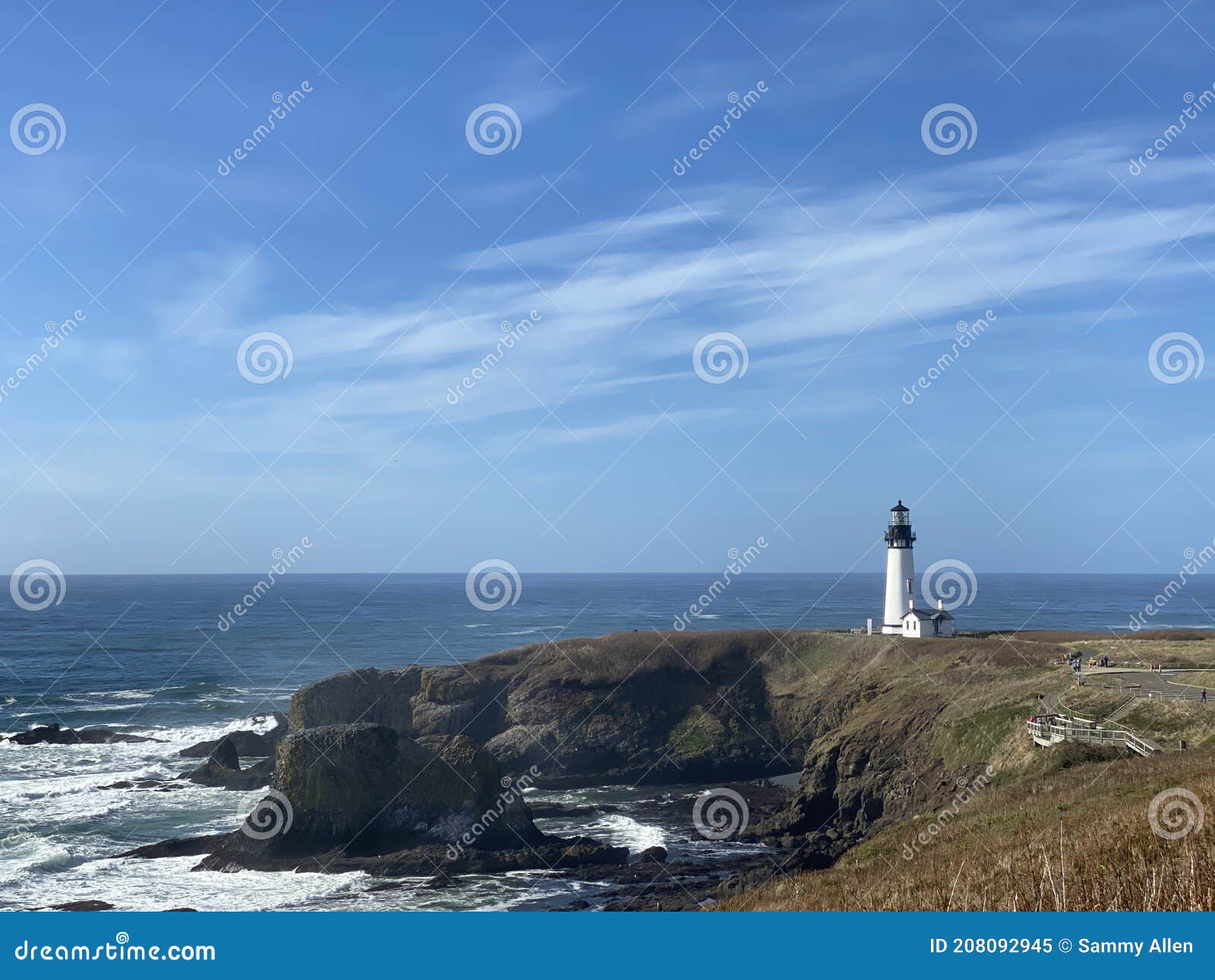 Long Shot of the Ocean and a Lighthouse Stock Image - Image of wave ...