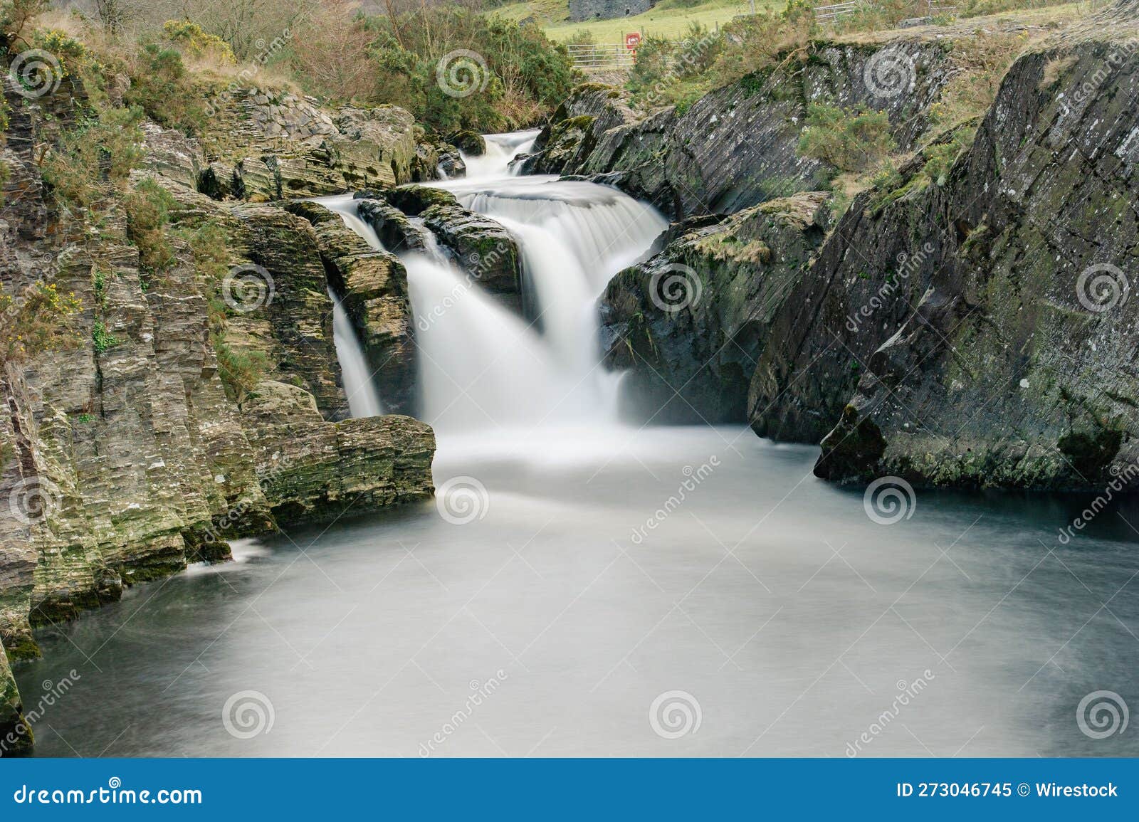 Long Exposure of a Beautiful Waterfall Cascading Down a Steep, Rocky ...
