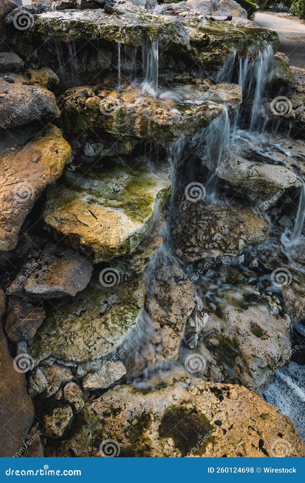 Long Exposure of a Beautiful Waterfall Falling Down the Mossy Rocks ...