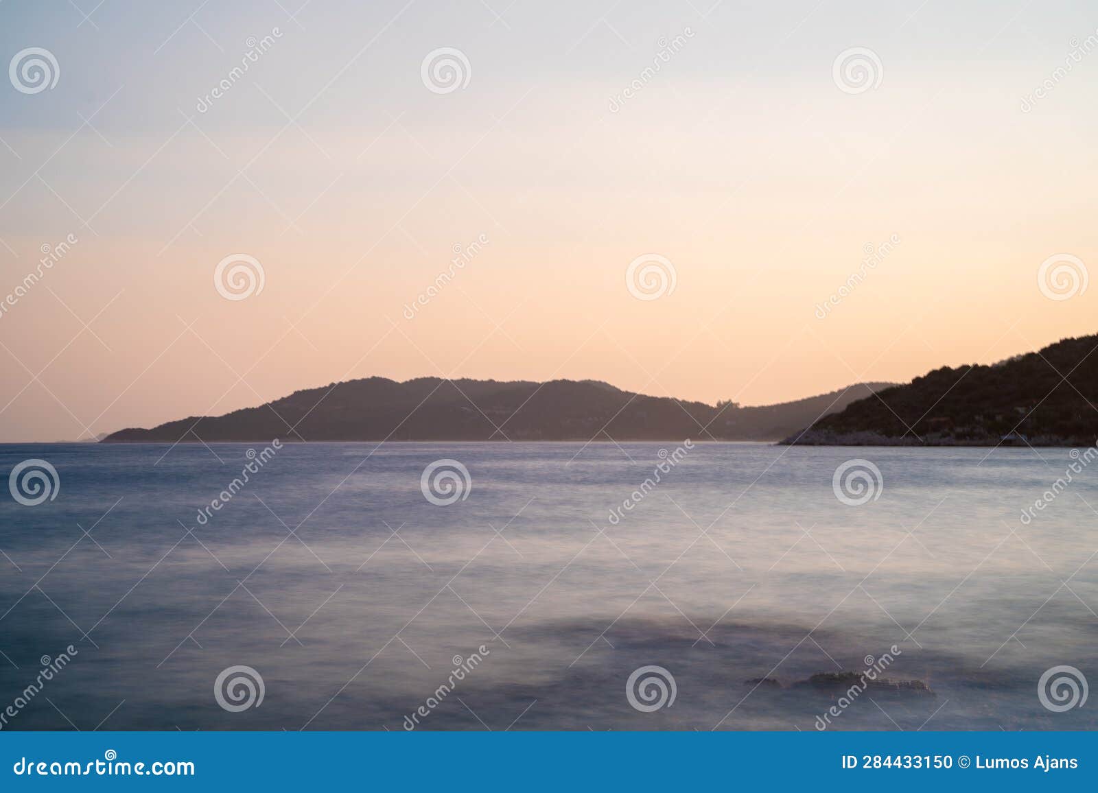 Long Exposure Daytime from the Cliffs To the Sea Stock Photo - Image of ...