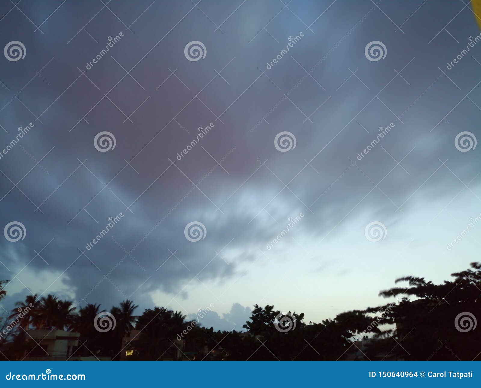 The Rush of White Clouds through the Evening Stock Photo - Image of ...
