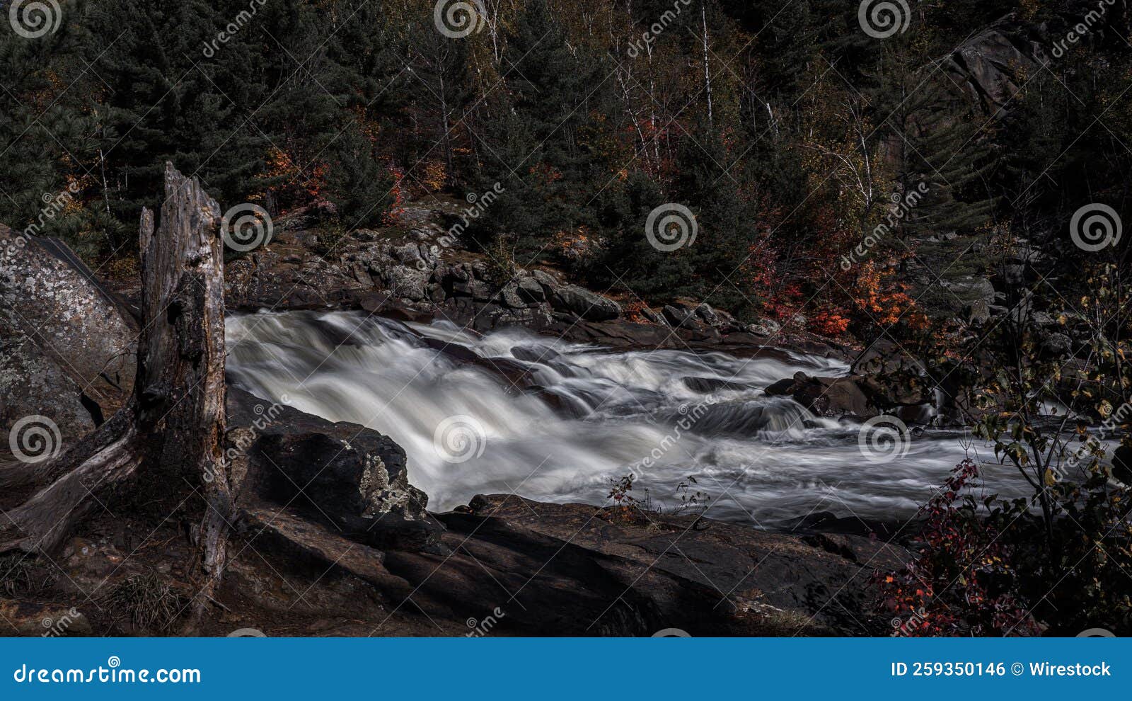 Long Exposure of a Flowing River with Big Rocks Stock Photo - Image of ...
