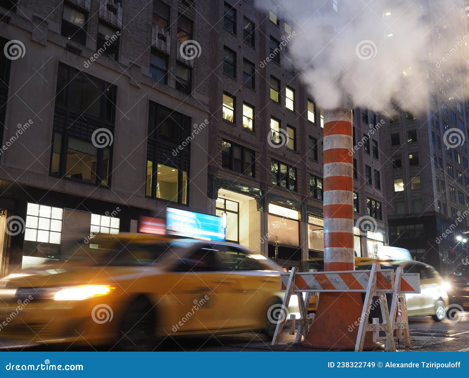 Long Exposure Image of a Cab Passing by a Steam Stack in New York ...