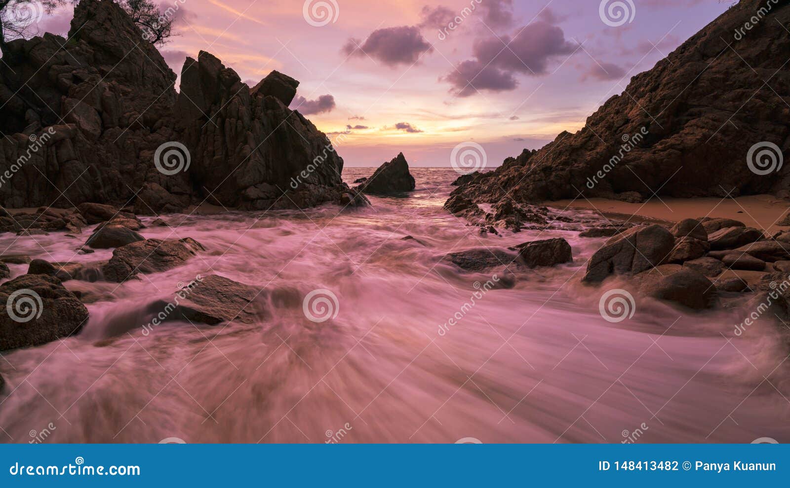 Long Exposure Image of Dramatic Sky Seascape with Rock in Sunset ...