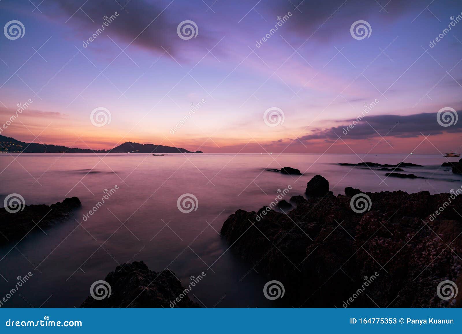 Long Exposure Image of Dramatic Sky Seascape with Rock in Sunset ...